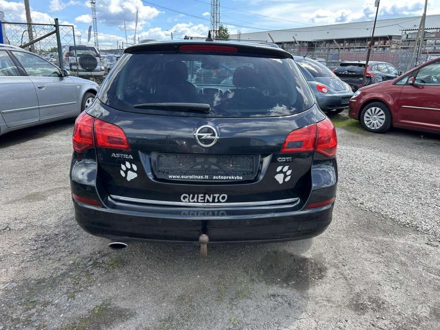 Black Opel Astra 2011 in Kaunas, with an engine capacity of 1.96 L and mileage of 276 thousand km for 2650 €, photo 7 on AUTOMOTO.COM.LV