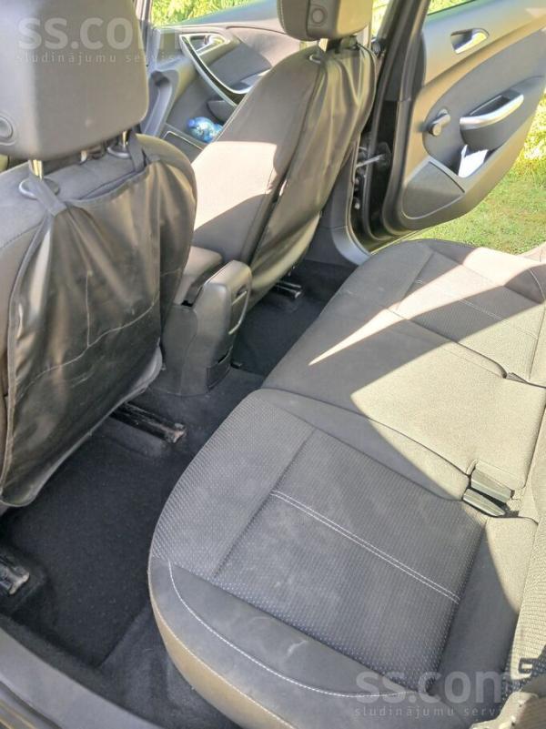 Melns Opel Astra 2011 Rīga, ar dzinēja tilpumu 2.00 L un nobraukumu 378 tūkst. km par 3500 €, foto 5 vietnē AUTOMOTO.COM.LV