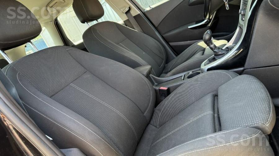Melns Opel Astra 2011 Rīga, ar dzinēja tilpumu 2.00 L un nobraukumu 280 tūkst. km par 2800 €, foto 10 vietnē AUTOMOTO.COM.LV