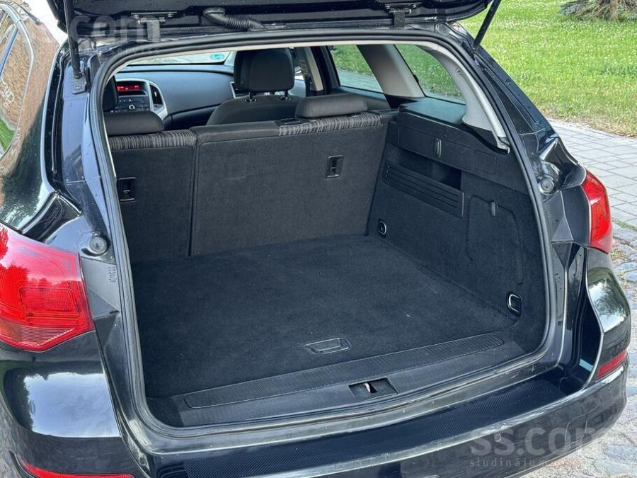Black Opel Astra 2011 in Jelgava, with an engine capacity of 1.70 L and mileage of 230 thousand km for 2650 €, photo 14 on AUTOMOTO.COM.LV