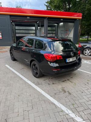 Black Opel Astra 2011 in Riga, with an engine capacity of 1.70 L and mileage of 270 thousand km for 3500 €, photo 4 on AUTOMOTO.COM.LV