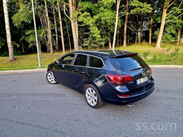 Melns Opel Astra 2011 Jelgava, ar dzinēja tilpumu 2.00 L un nobraukumu 440 tūkst. km par 2850 €, foto 5 vietnē AUTOMOTO.COM.LV
