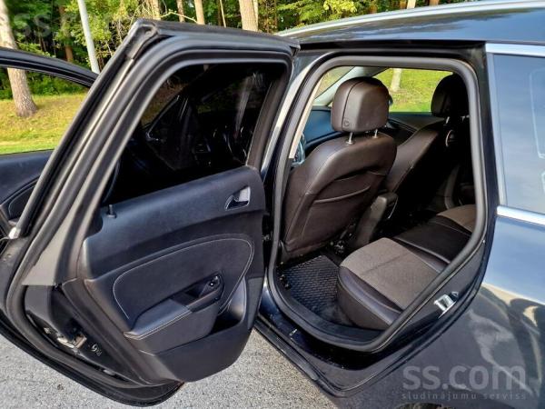 Melns Opel Astra 2011 Jelgava, ar dzinēja tilpumu 2.00 L un nobraukumu 440 tūkst. km par 2850 €, foto 8 vietnē AUTOMOTO.COM.LV