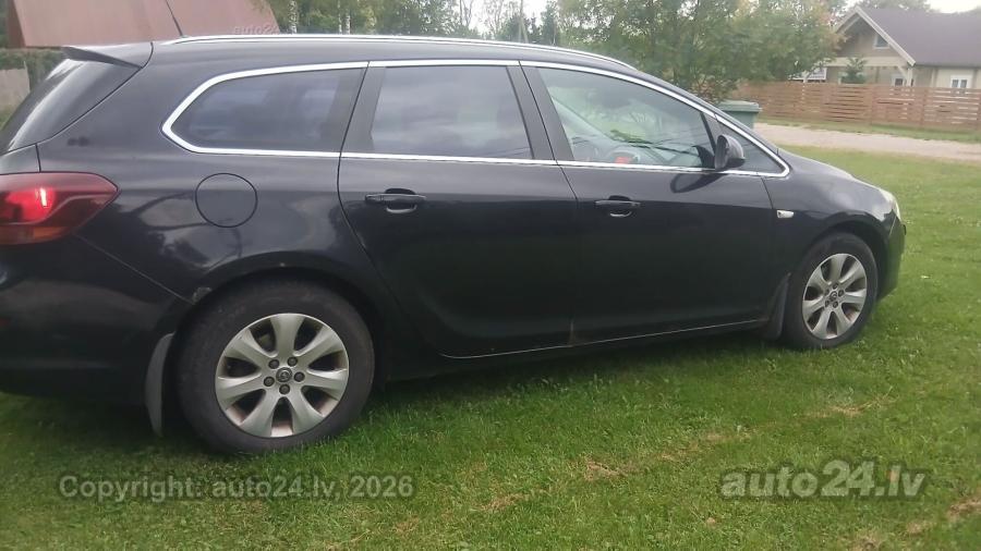 Melns Opel Astra 2011 Tallina, ar dzinēja tilpumu 1.40 L un nobraukumu 265 tūkst. km par 2400 €, foto 3 vietnē AUTOMOTO.COM.LV