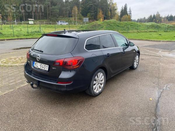 Melns Opel Astra 2012 Ogre, ar dzinēja tilpumu 2.00 L un nobraukumu 293 tūkst. km par 4500 €, foto 3 vietnē AUTOMOTO.COM.LV