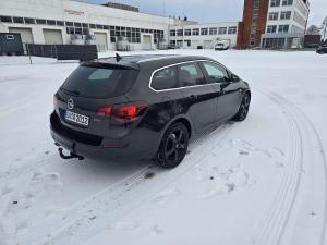 Black Opel Astra 2012 in Marijampole, with an engine capacity of 1.96 L and mileage of 280 thousand km for 3400 €, photo 6 on AUTOMOTO.COM.LV