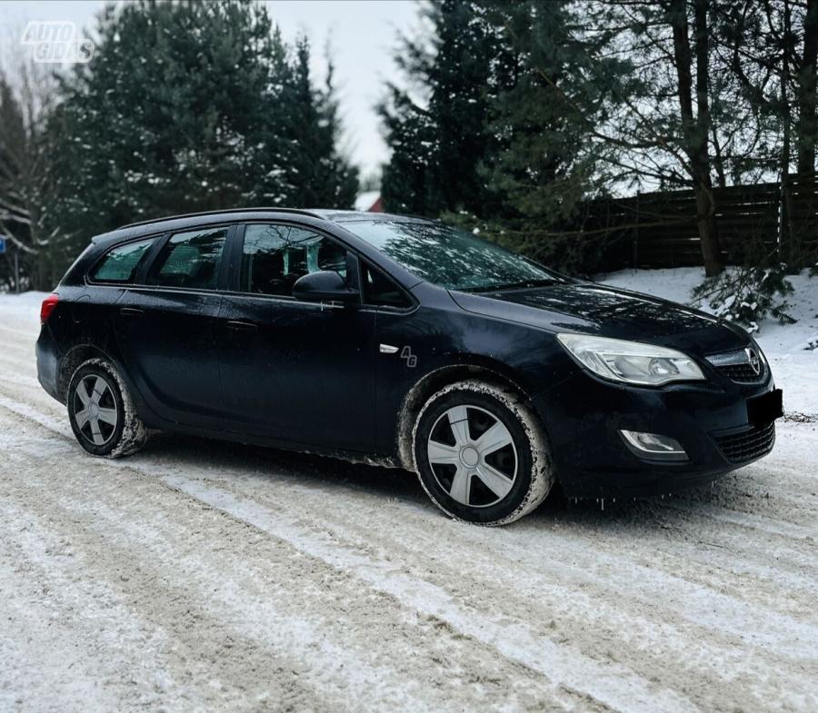 Black Opel Astra 2012 in Radviliskis, with an engine capacity of 1.40 L and mileage of 197 thousand km for 2700 €, photo 4 on AUTOMOTO.COM.LV