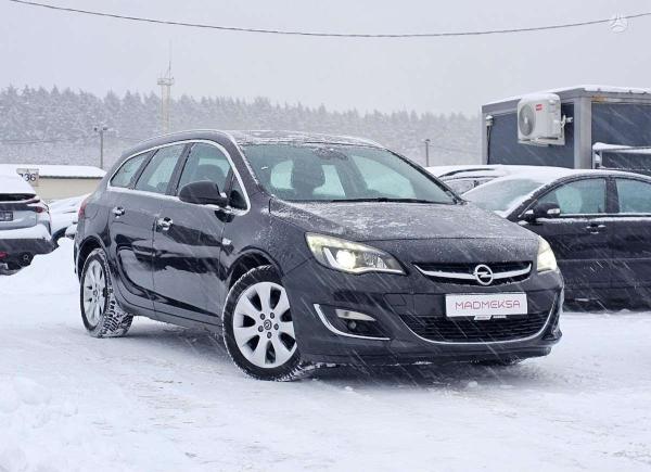 Black Opel Astra 2012 in Vilnius, with an engine capacity of 1.69 L and mileage of 282 thousand km for 4450 €, photo 1 on AUTOMOTO.COM.LV