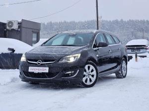 Black Opel Astra 2012 in Vilnius, with an engine capacity of 1.69 L and mileage of 282 thousand km for 4450 €, photo 8 on AUTOMOTO.COM.LV