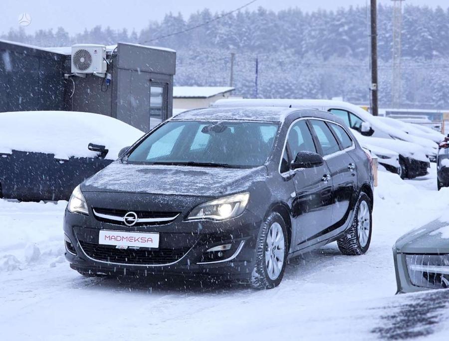 Black Opel Astra 2012 in Vilnius, with an engine capacity of 1.69 L and mileage of 282 thousand km for 4450 €, photo 12 on AUTOMOTO.COM.LV