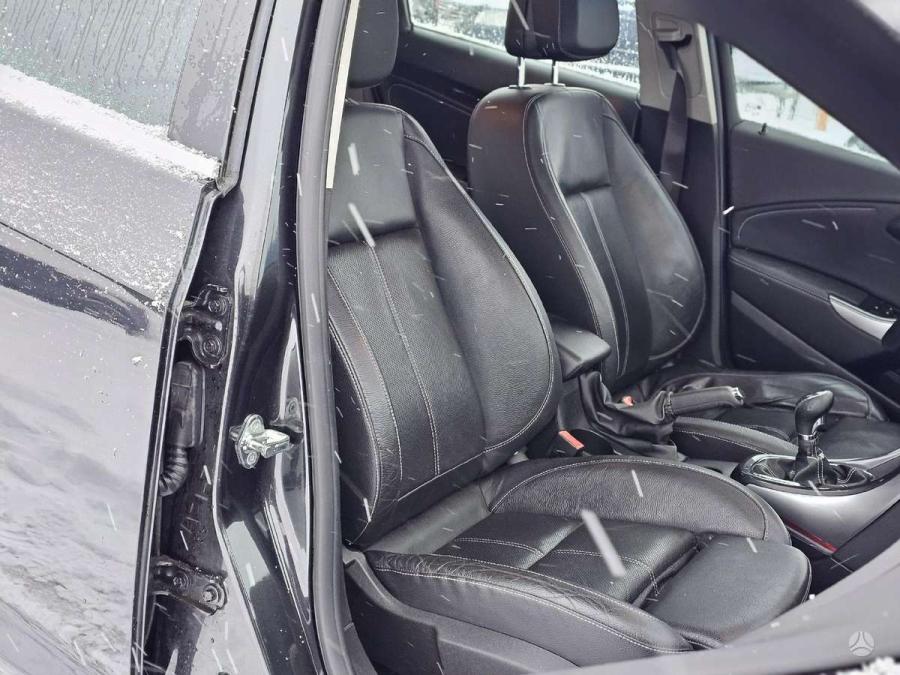 Black Opel Astra 2012 in Vilnius, with an engine capacity of 1.69 L and mileage of 282 thousand km for 4450 €, photo 20 on AUTOMOTO.COM.LV