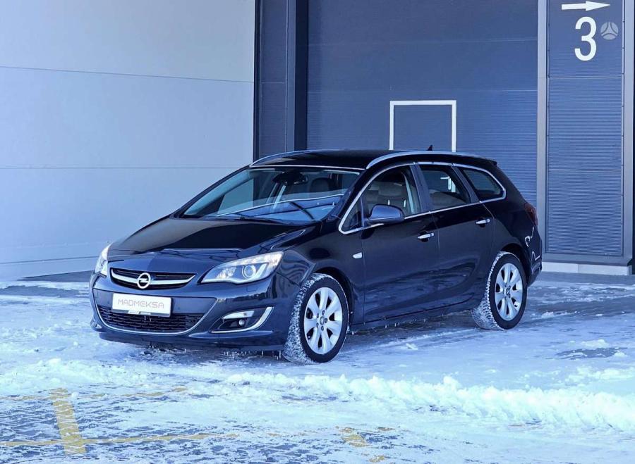 Black Opel Astra 2012 in Vilnius, with an engine capacity of 1.69 L and mileage of 282 thousand km for 4450 €, photo 12 on AUTOMOTO.COM.LV