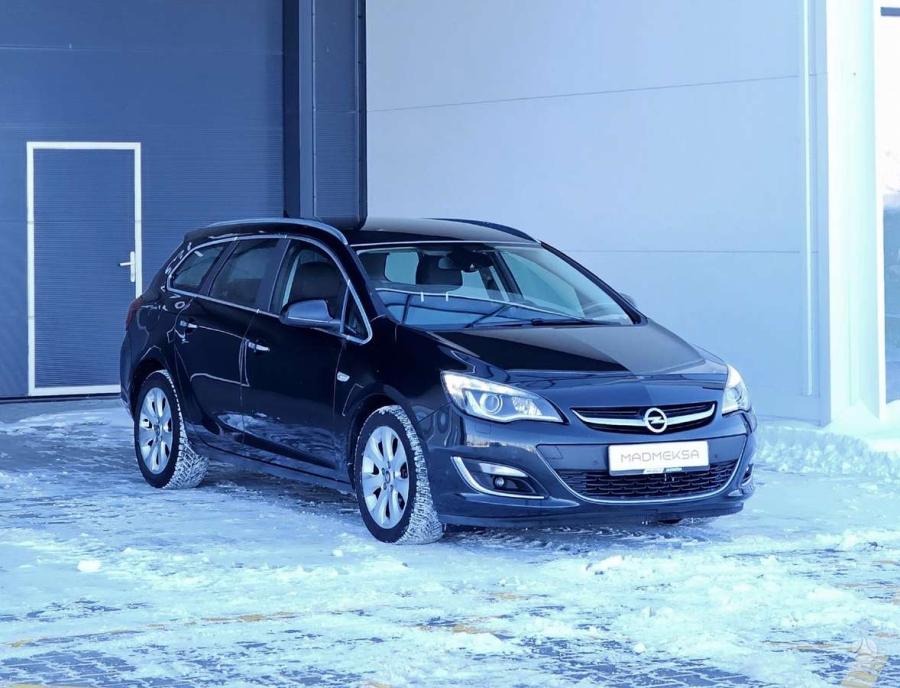 Black Opel Astra 2012 in Vilnius, with an engine capacity of 1.69 L and mileage of 282 thousand km for 4450 €, photo 13 on AUTOMOTO.COM.LV