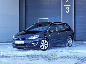 Black Opel Astra 2012 in Vilnius, with an engine capacity of 1.70 L and mileage of 282 thousand km for 3950 €, photo 4 on AUTOMOTO.COM.LV