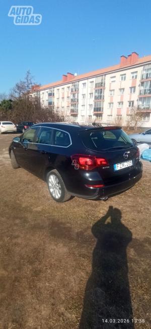 Black Opel Astra 2012 in Klaipeda, with an engine capacity of 1.40 L and mileage of 196 thousand km for 2950 €, photo 8 on AUTOMOTO.COM.LV