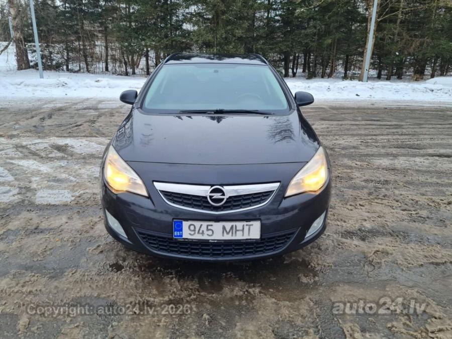 Black Opel Astra 2012 in Tallinn, with an engine capacity of 1.60 L and mileage of 347 thousand km for 2599 €, photo 1 on AUTOMOTO.COM.LV