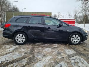 Black Opel Astra 2012 in Tallinn, with an engine capacity of 1.60 L and mileage of 347 thousand km for 2599 €, photo 2 on AUTOMOTO.COM.LV