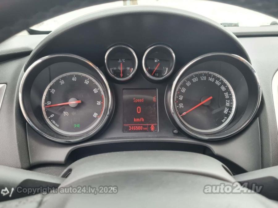 Black Opel Astra 2012 in Tallinn, with an engine capacity of 1.60 L and mileage of 347 thousand km for 2599 €, photo 5 on AUTOMOTO.COM.LV