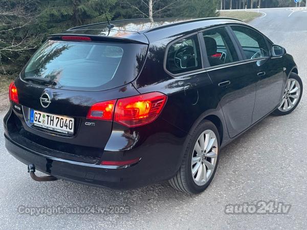 Black Opel Astra 2012 in Tartu, with an engine capacity of 1.70 L and mileage of 245 thousand km for 3990 €, photo 4 on AUTOMOTO.COM.LV