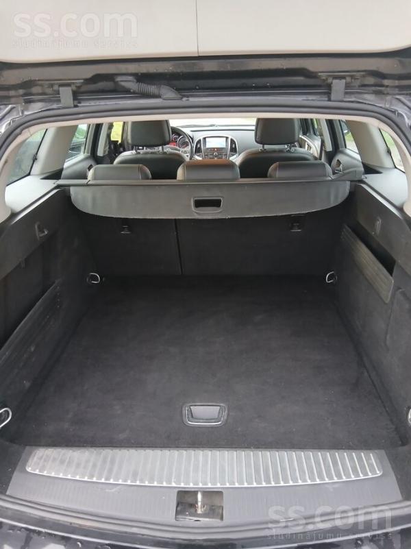 Black Opel Astra 2012 in Bauska, with an engine capacity of 1.70 L and mileage of 311 thousand km for 2950 €, photo 10 on AUTOMOTO.COM.LV