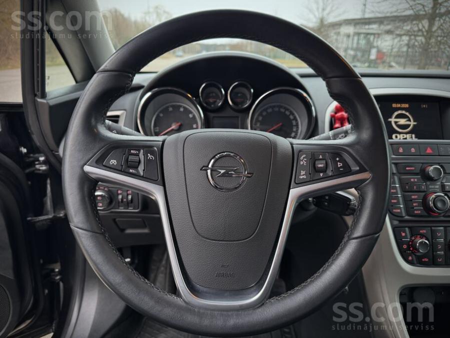 Black Opel Astra 2012 in Riga, with an engine capacity of 1.70 L and mileage of 211 thousand km for 4500 €, photo 17 on AUTOMOTO.COM.LV