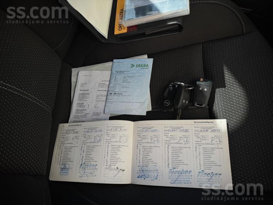 Black Opel Astra 2012 in Riga, with an engine capacity of 1.70 L and mileage of 211 thousand km for 4500 €, photo 28 on AUTOMOTO.COM.LV