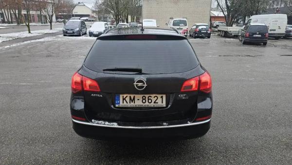 Black Opel Astra 2012 in Riga, with an engine capacity of 1.70 L and mileage of 294 thousand km for 2450 €, photo 6 on AUTOMOTO.COM.LV