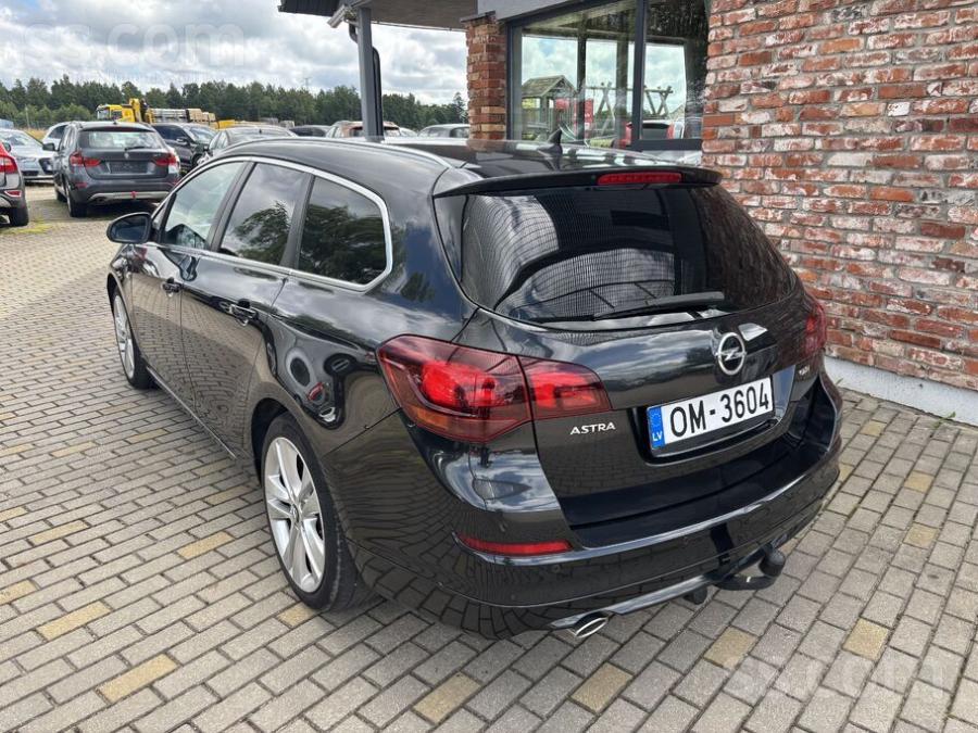 Black Opel Astra 2012 in Talsi, with an engine capacity of 2.00 L and mileage of 0 thousand km for 4900 €, photo 3 on AUTOMOTO.COM.LV