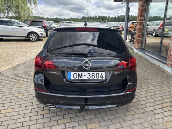 Black Opel Astra 2012 in Talsi, with an engine capacity of 2.00 L and mileage of 0 thousand km for 4900 €, photo 3 on AUTOMOTO.COM.LV