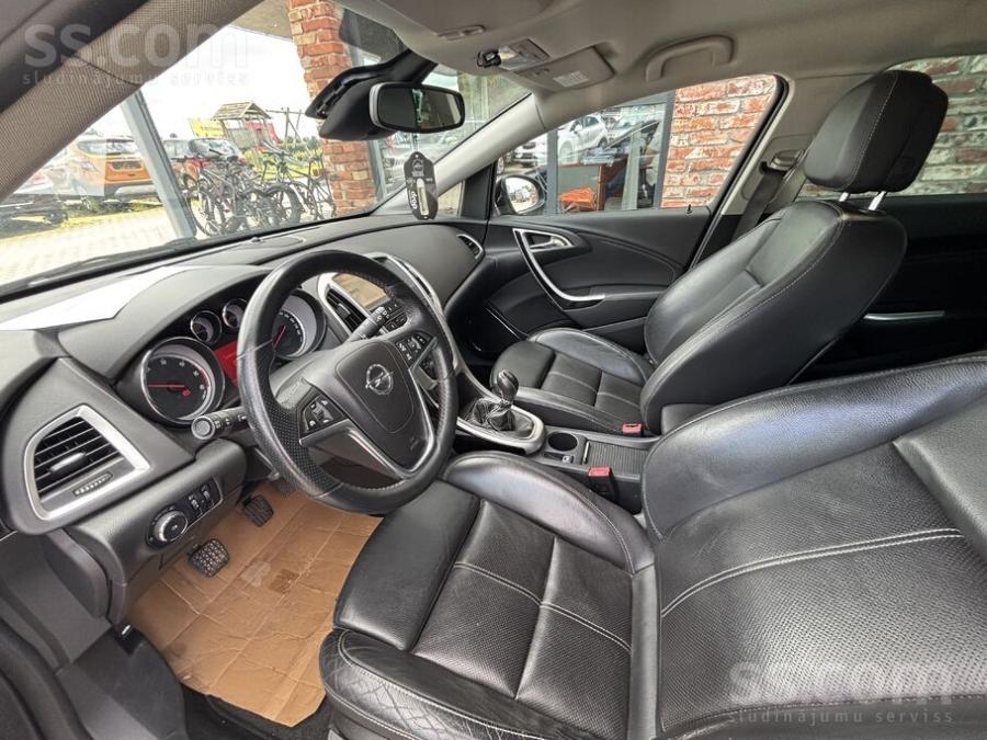 Black Opel Astra 2012 in Talsi, with an engine capacity of 2.00 L and mileage of 0 thousand km for 4900 €, photo 13 on AUTOMOTO.COM.LV