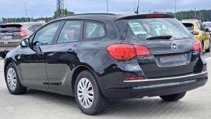 Melns Opel Astra 2012 Tauragė, ar dzinēja tilpumu 1.25 L un nobraukumu 270 tūkst. km par 2400 €, foto 8 vietnē AUTOMOTO.COM.LV