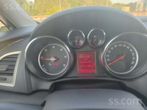 Black Opel Astra 2012 in Riga, with an engine capacity of 1.70 L and mileage of 236 thousand km for 3500 €, photo 12 on AUTOMOTO.COM.LV