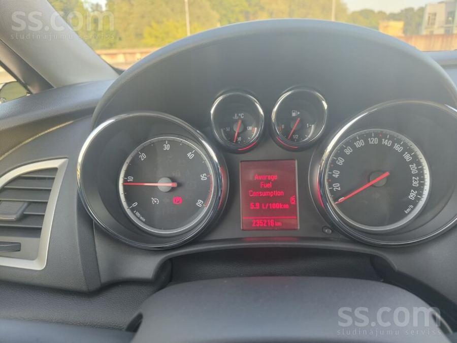 Black Opel Astra 2012 in Riga, with an engine capacity of 1.70 L and mileage of 236 thousand km for 3500 €, photo 12 on AUTOMOTO.COM.LV
