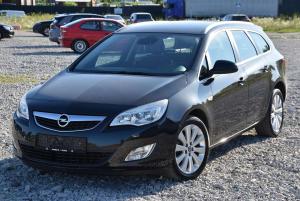 Black Opel Astra 2012 in Vilnius, with an engine capacity of 1.40 L and mileage of 194 thousand km for 2900 €, photo 4 on AUTOMOTO.COM.LV