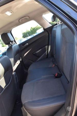 Black Opel Astra 2012 in Vilnius, with an engine capacity of 1.40 L and mileage of 194 thousand km for 2900 €, photo 12 on AUTOMOTO.COM.LV