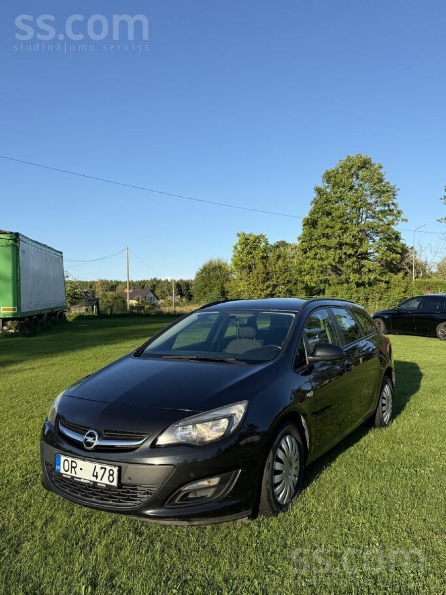 Black Opel Astra 2012 in Valka, with an engine capacity of 1.70 L and mileage of 304 thousand km for 4000 €, photo 1 on AUTOMOTO.COM.LV