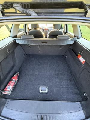 Black Opel Astra 2012 in Valka, with an engine capacity of 1.70 L and mileage of 304 thousand km for 4000 €, photo 13 on AUTOMOTO.COM.LV