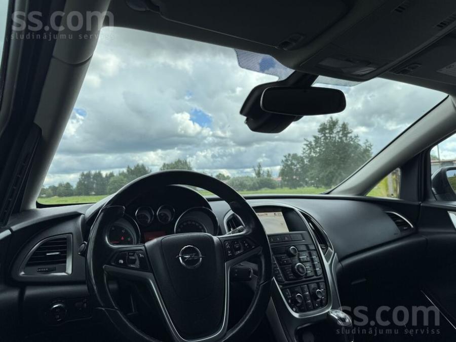 Black Opel Astra 2012 in Cesis, with an engine capacity of 2.00 L and mileage of 0 thousand km for 3500 €, photo 12 on AUTOMOTO.COM.LV
