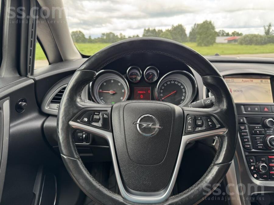 Black Opel Astra 2012 in Cesis, with an engine capacity of 2.00 L and mileage of 0 thousand km for 3500 €, photo 25 on AUTOMOTO.COM.LV