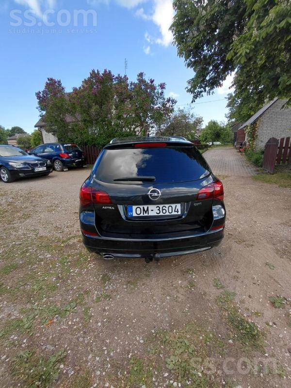 Black Opel Astra 2012 in Talsi, with an engine capacity of 2.00 L and mileage of 0 thousand km for 4550 €, photo 3 on AUTOMOTO.COM.LV