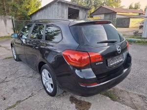 Black Opel Astra 2012 in Utena, with an engine capacity of 1.69 L and mileage of 240 thousand km for 2450 €, photo 10 on AUTOMOTO.COM.LV