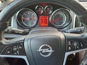 Black Opel Astra 2012 in Utena, with an engine capacity of 1.69 L and mileage of 240 thousand km for 2450 €, photo 16 on AUTOMOTO.COM.LV