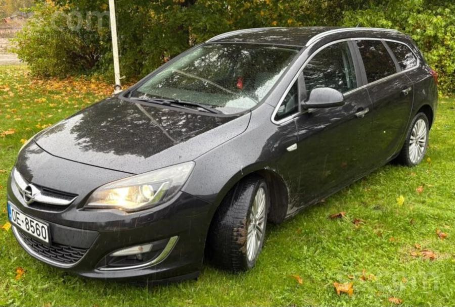 Black Opel Astra 2012 in Kuldiga, with an engine capacity of 1.70 L and mileage of 328 thousand km for 3300 €, photo 1 on AUTOMOTO.COM.LV