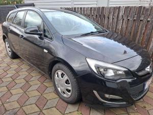 Black Opel Astra 2013 in Vilnius, with an engine capacity of 1.69 L and mileage of 222 thousand km for 3900 €, photo 2 on AUTOMOTO.COM.LV