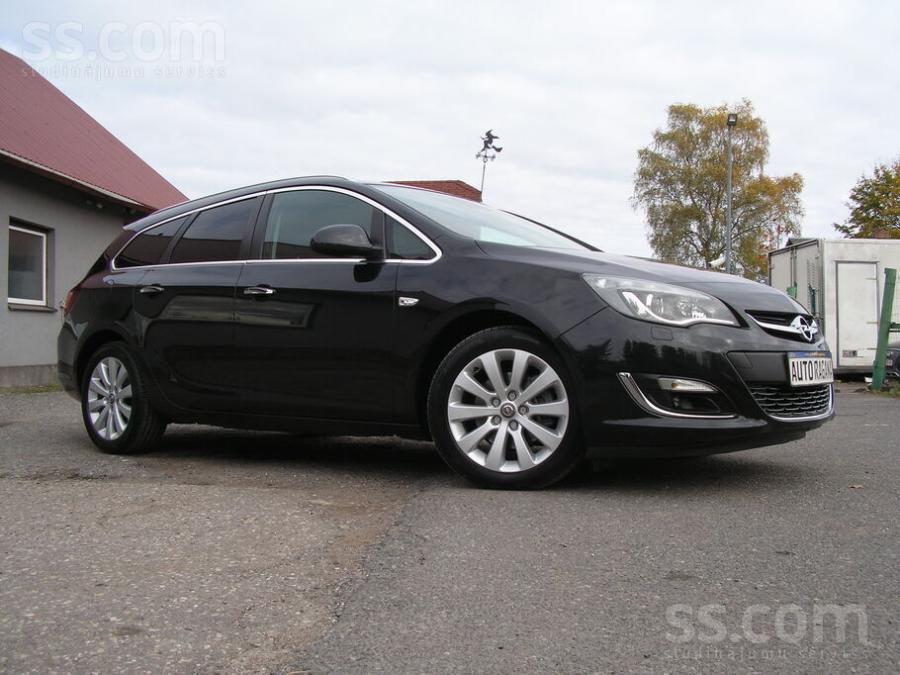 Black Opel Astra 2013 in Riga, with an engine capacity of 1.70 L and mileage of 182 thousand km for 5750 €, photo 1 on AUTOMOTO.COM.LV