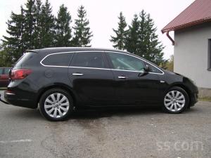 Black Opel Astra 2013 in Riga, with an engine capacity of 1.70 L and mileage of 182 thousand km for 5750 €, photo 4 on AUTOMOTO.COM.LV
