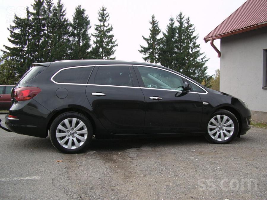 Black Opel Astra 2013 in Riga, with an engine capacity of 1.70 L and mileage of 182 thousand km for 5750 €, photo 4 on AUTOMOTO.COM.LV