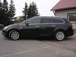 Black Opel Astra 2013 in Riga, with an engine capacity of 1.70 L and mileage of 182 thousand km for 5750 €, photo 9 on AUTOMOTO.COM.LV