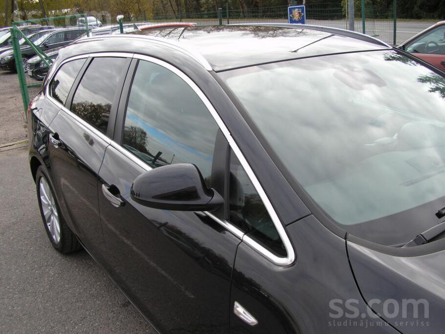 Black Opel Astra 2013 in Riga, with an engine capacity of 1.70 L and mileage of 182 thousand km for 5750 €, photo 12 on AUTOMOTO.COM.LV