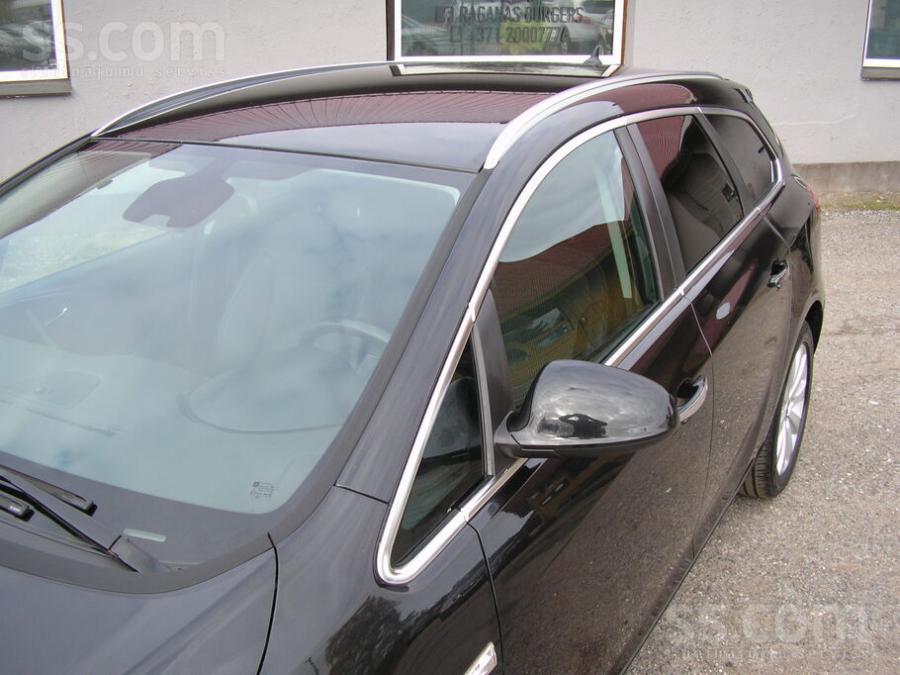 Black Opel Astra 2013 in Riga, with an engine capacity of 1.70 L and mileage of 182 thousand km for 5750 €, photo 14 on AUTOMOTO.COM.LV